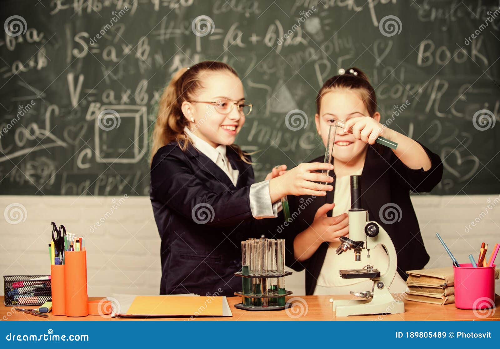 Educational Experiment Concept. Microscope and Test Tubes on Table ...