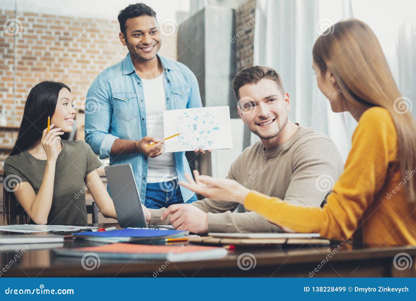 Attractive Four Students Working on Project Stock Image - Image of ...
