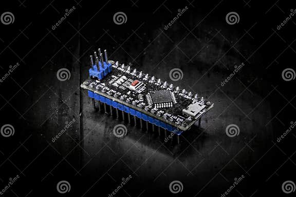 Educational Microcontroller Board Arduino On Black Background Stock