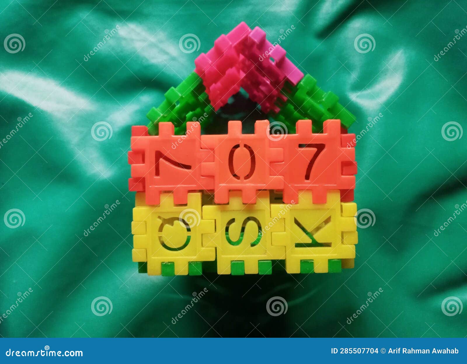 Educational Plastic Puzzle Toy Called Building Blocks on Colorful ...