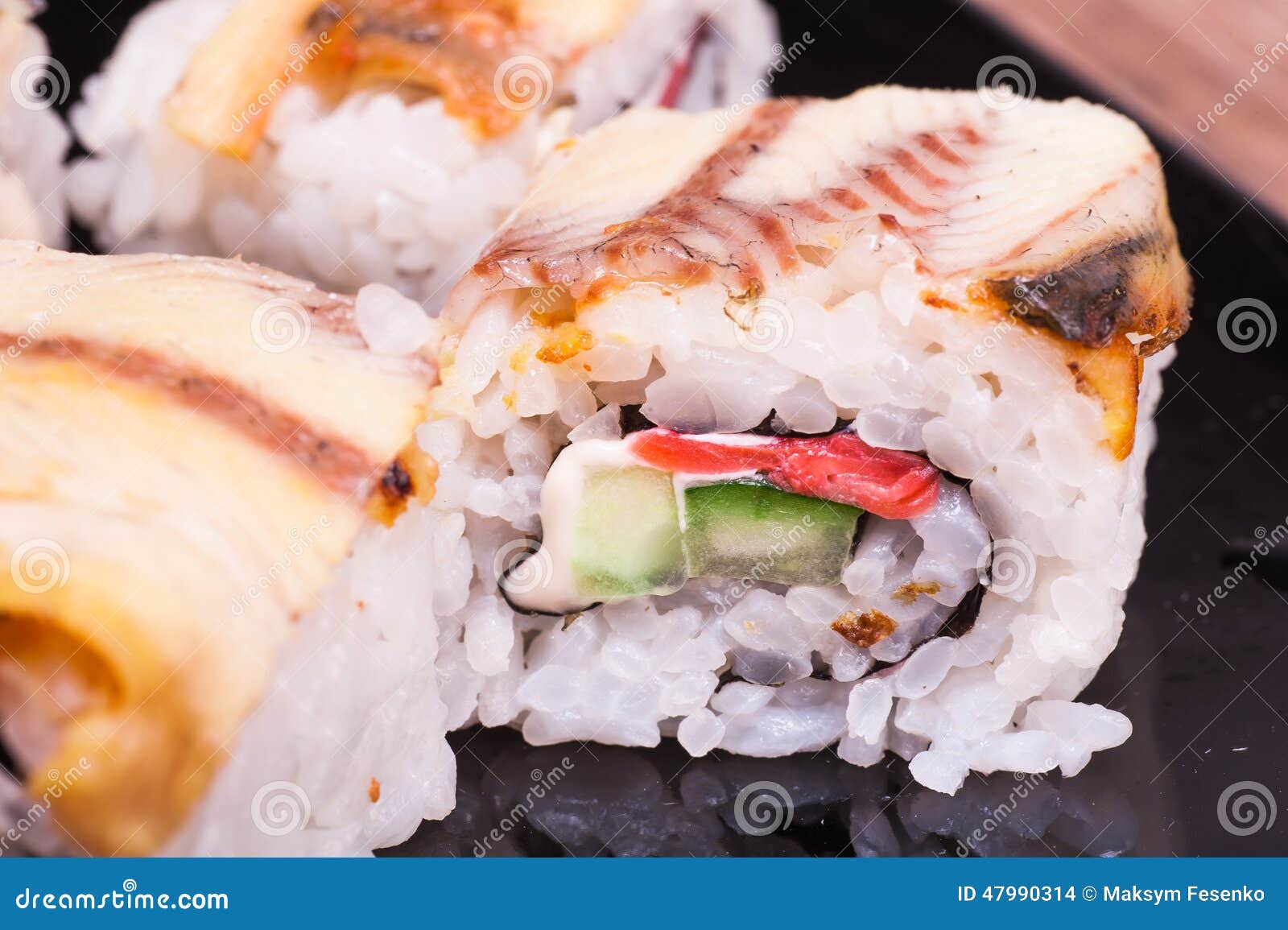 Eel Unagi Sushi Roll on Wooden Background Stock Photo - Image of fish ...