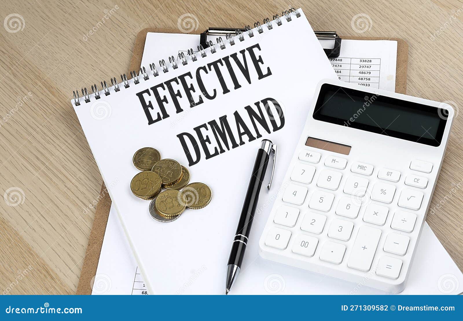 EFFECTIVE DEMAND Text on a Notebook with Chart and Calculator and Coins ... EFFECTIVE DEMAND Text on a Notebook with Chart and Calculator and Coins ...