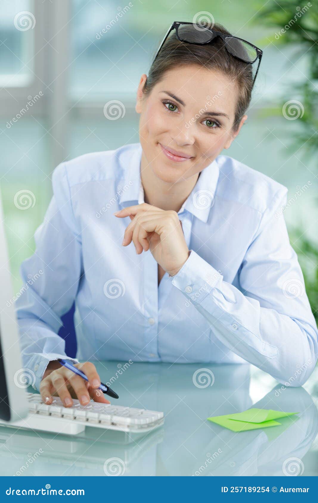 Efficient Secretary Looking at Camera Stock Photo - Image of ...