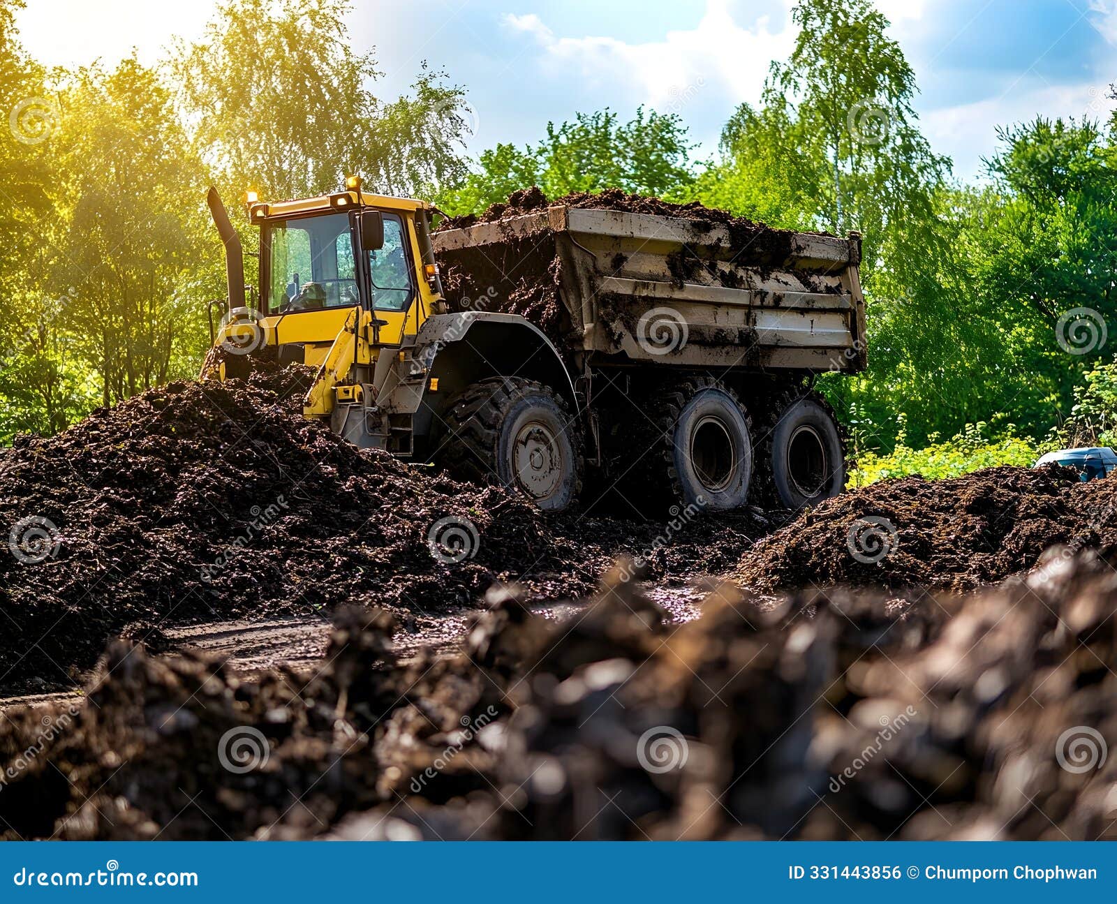 Efficient Tractor Dump Truck Transporting Compost Material at Worksite ...
