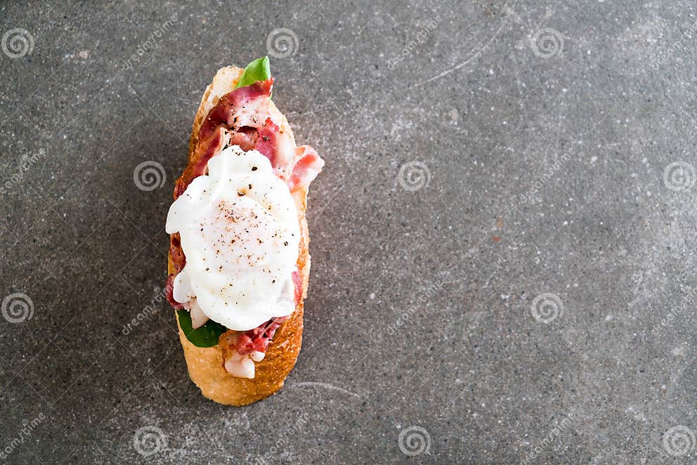 Egg Benedict with Bacon and Rocket Stock Photo - Image of isolated ...