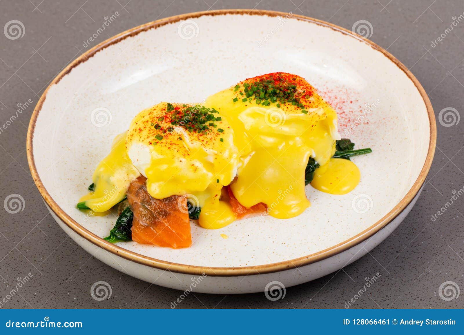 Egg Benedict with cheese stock image. Image of green - 128066461