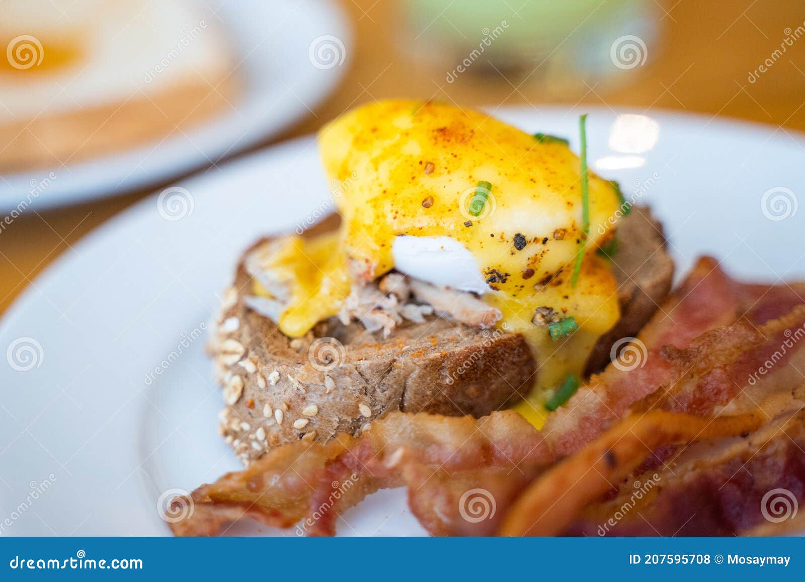 Egg Benedict with Crispy Bacon for Breakfast Stock Photo - Image of ...