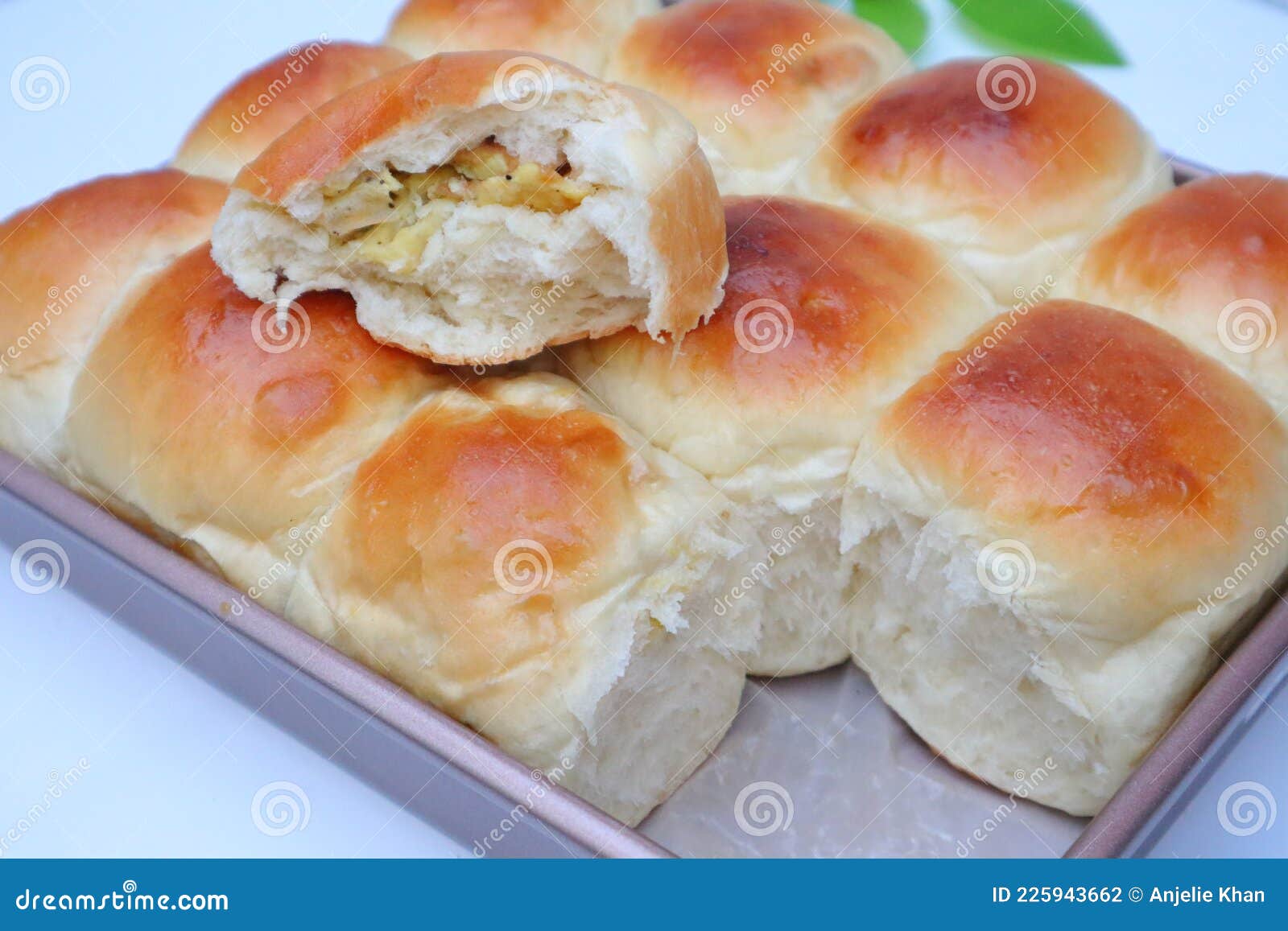 Egg Bread Rolls in Baking Tray Stock Photo - Image of icing, dessert ...