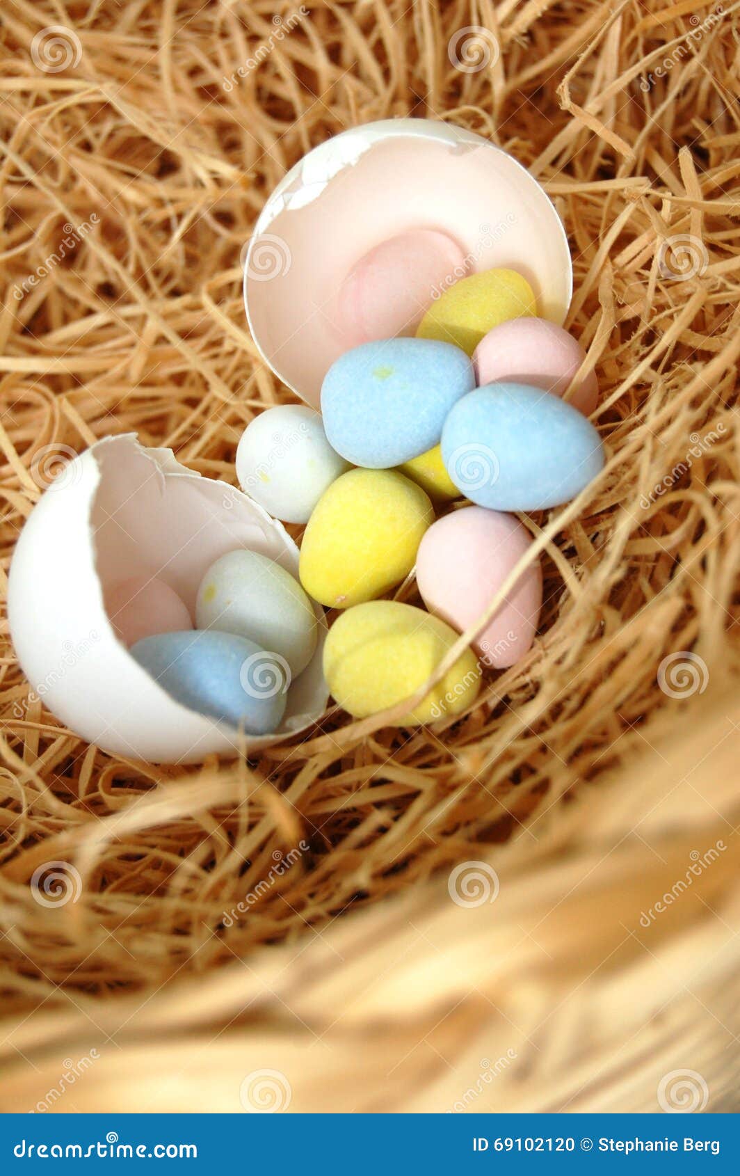 Egg Cracked with Mini Chocolate Eggs Inside Stock Photo - Image of ...