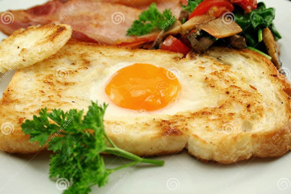 Egg Embedded in Toast stock image. Image of golden, meal - 29613647