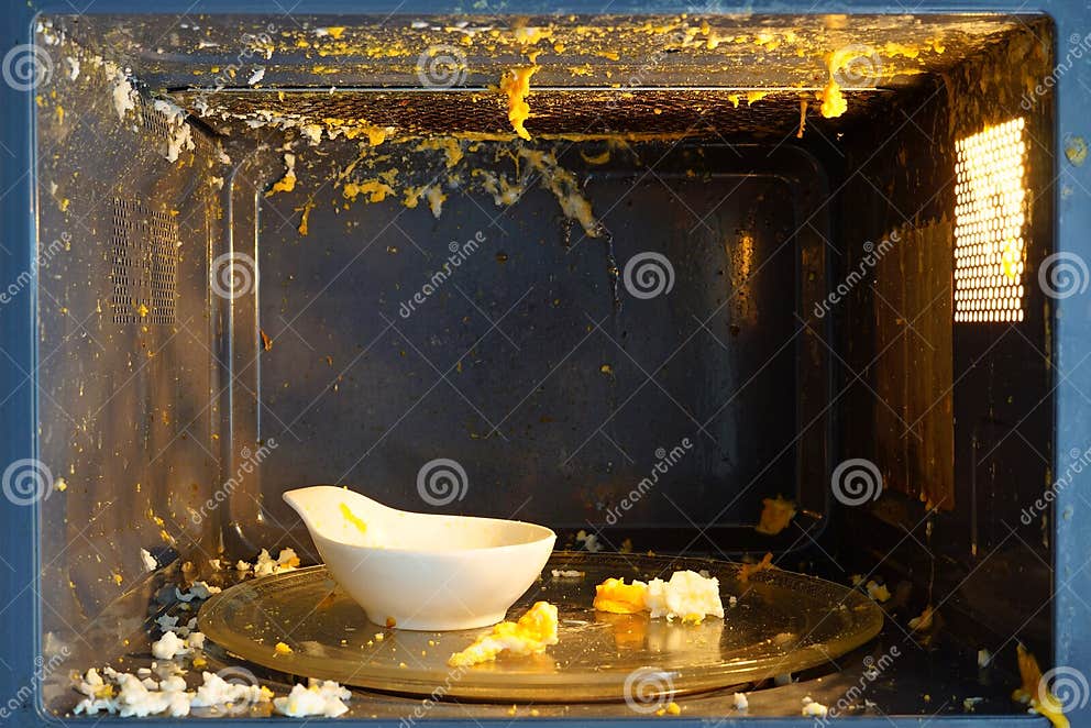 Egg Exploded in the Microwave Stock Image - Image of dirty, microwave ...