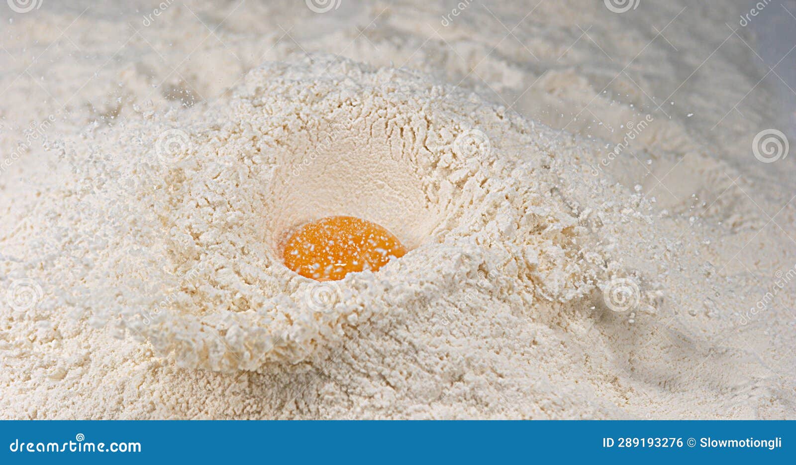 Egg Falling on Flour stock photo. Image of falling, studio - 289193276