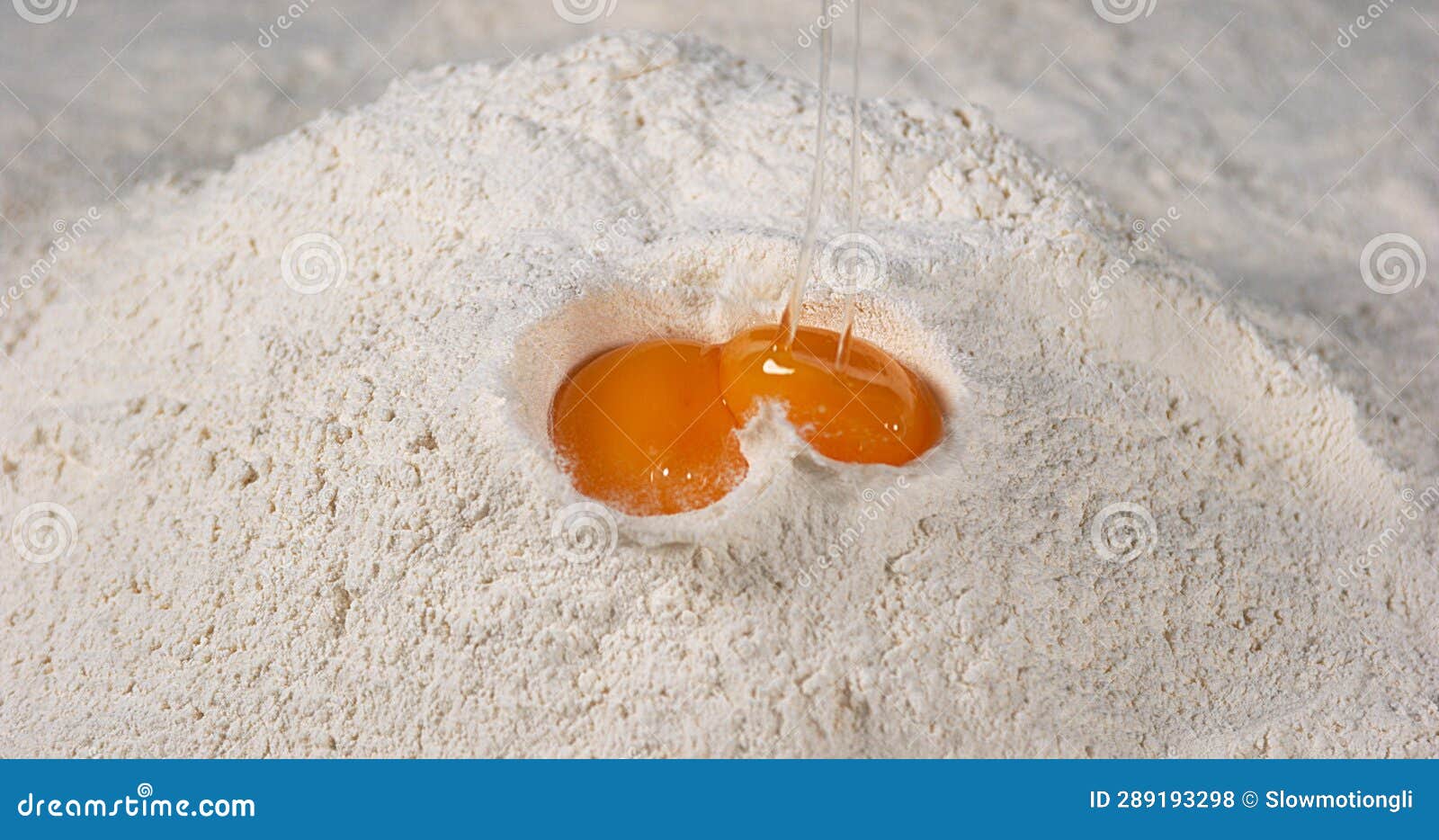 Egg Falling on Flour stock photo. Image of motion, healthy - 289193298