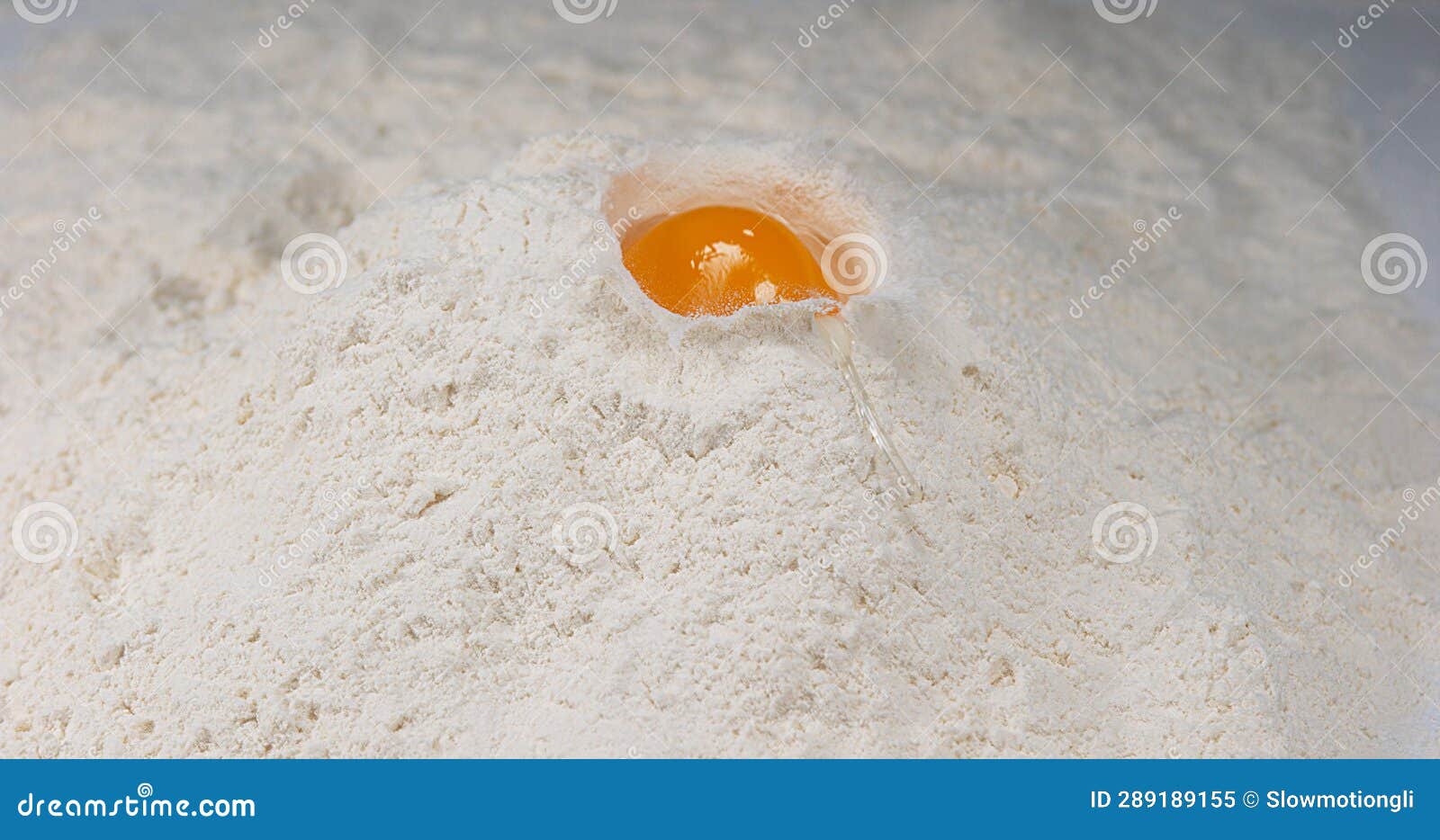 Egg Falling into Flour Against White Background Stock Image - Image of ...