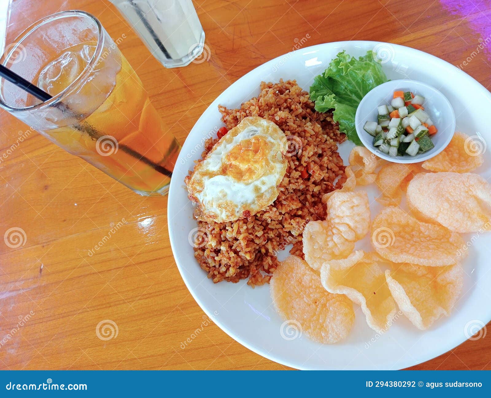 Egg Fried Rice and Iced Tea at the Dinner Table Stock Photo - Image of ...
