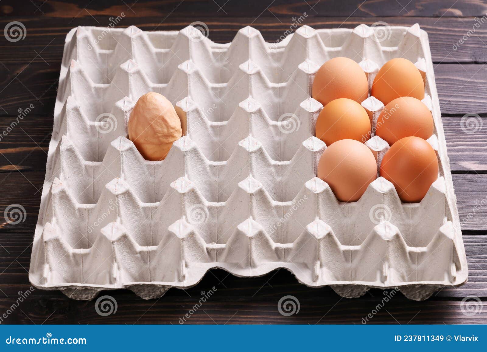 Egg with Non-ideal Form Opposite Group of Perfect Eggs Stock Image ...