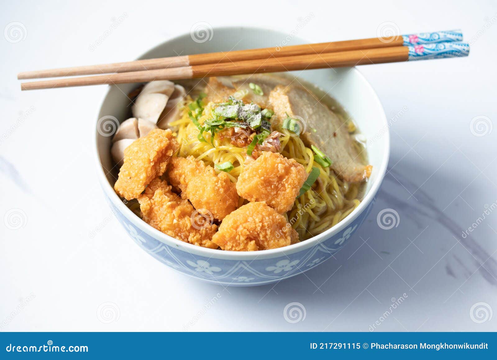 Egg Noodles and Fried Chicken with Fish Balls in Cups Stock Image ...