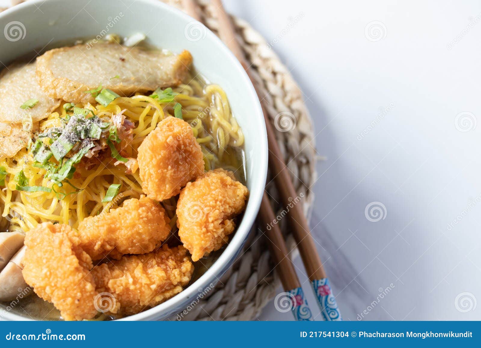 Egg Noodles and Fried Chicken with Fish Balls in Cups Stock Photo ...