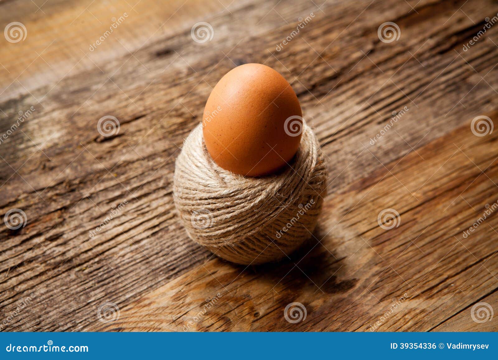 Egg in rope coil on old stock photo. Image of cooking - 39354336