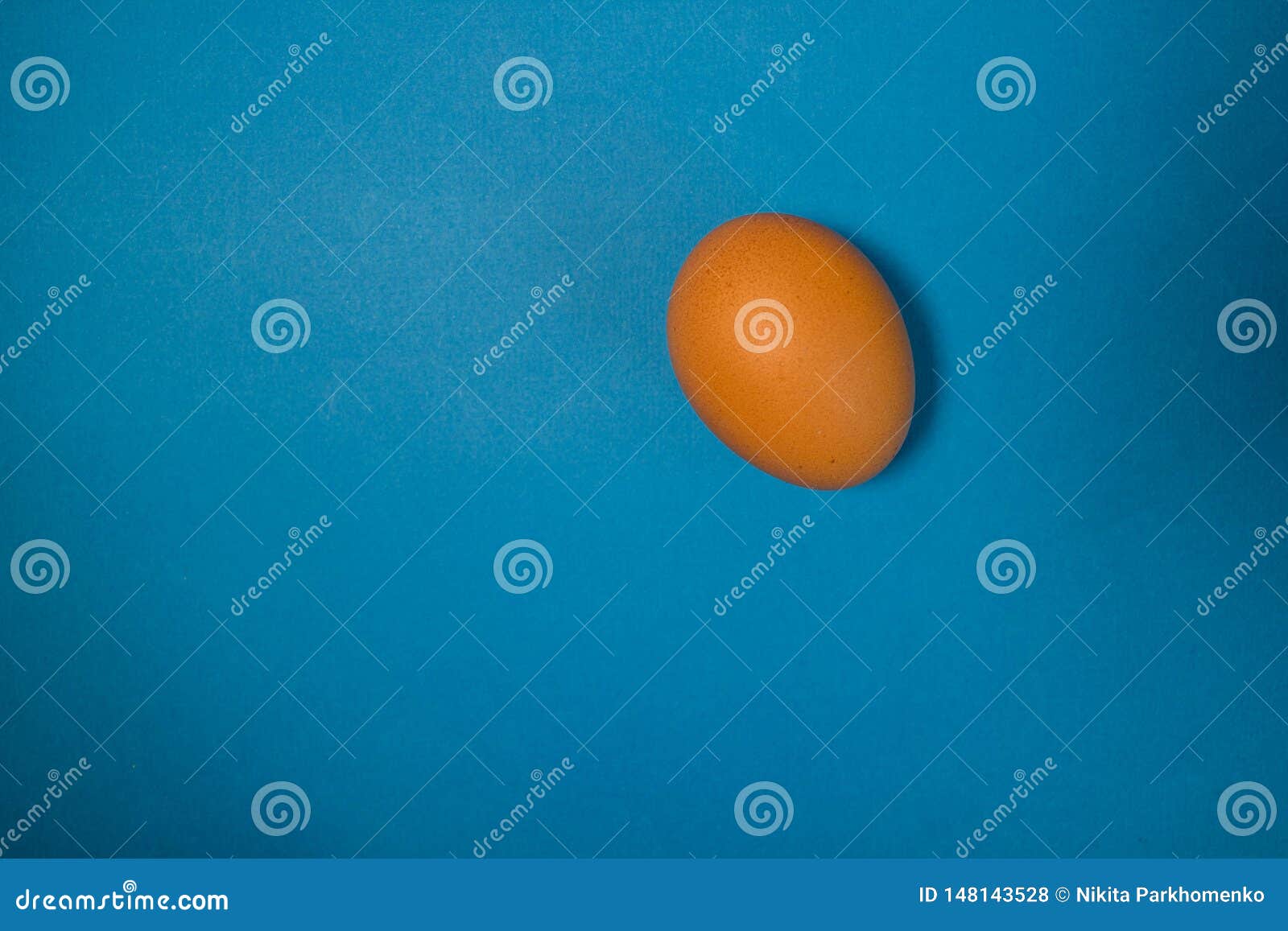 Egg in the Shell on a Blue Background Stock Photo - Image of cooking ...