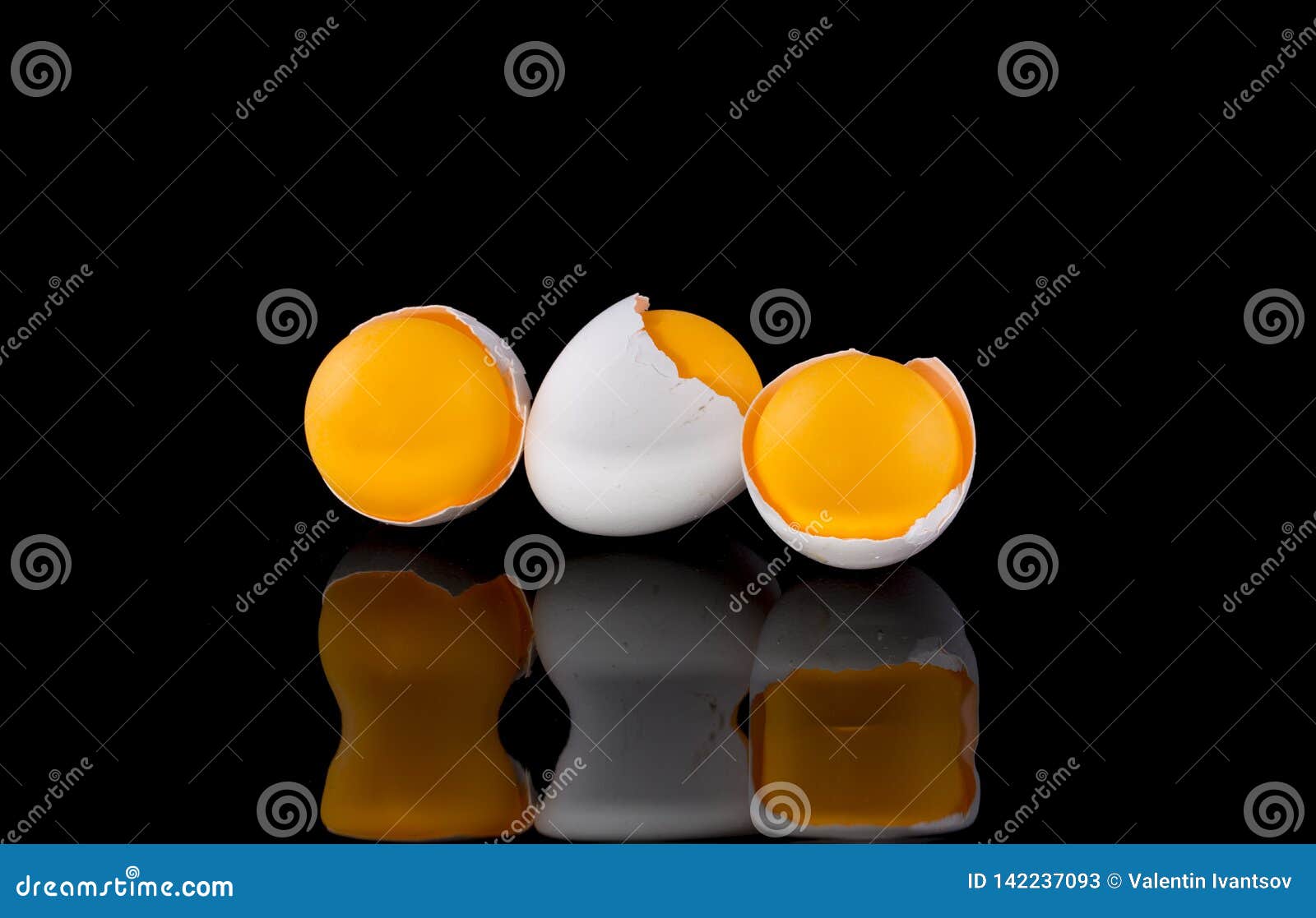Egg Shell with Orange Ball on a Black Background Stock Image - Image of ...