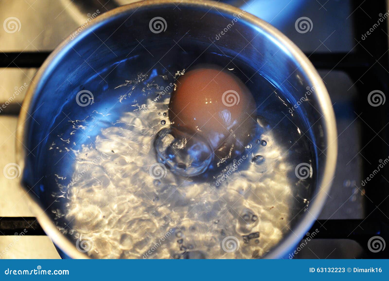 Egg Starting To Boil in a Pot Stock Image - Image of steel, metal: 63132223