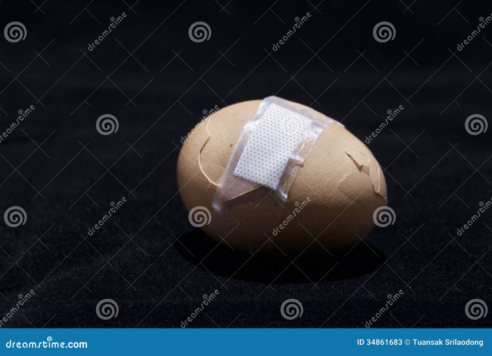 Egg with sticking plaster stock image. Image of fragile - 34861683