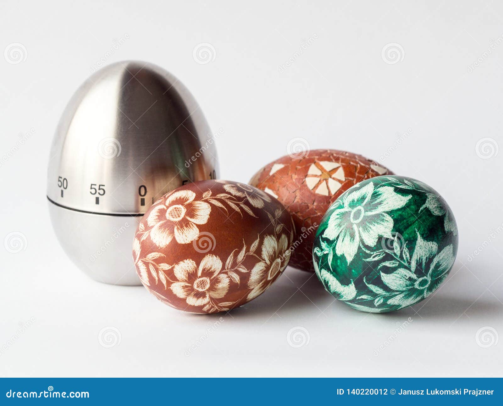Egg timer and easter eggs stock photo. Image of food - 140220012