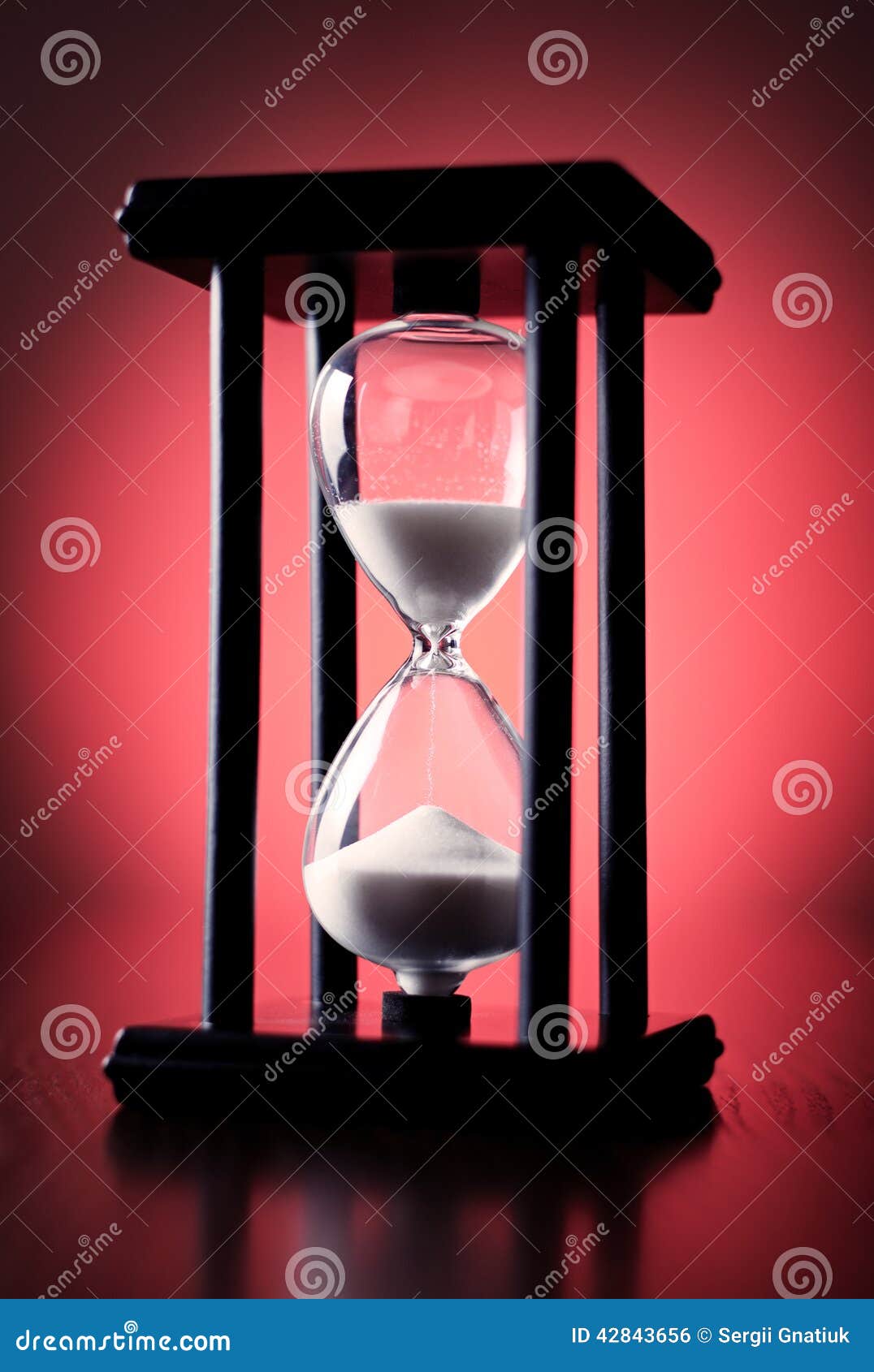 Egg Timer or Hourglass on a Red Background Stock Photo - Image of ...