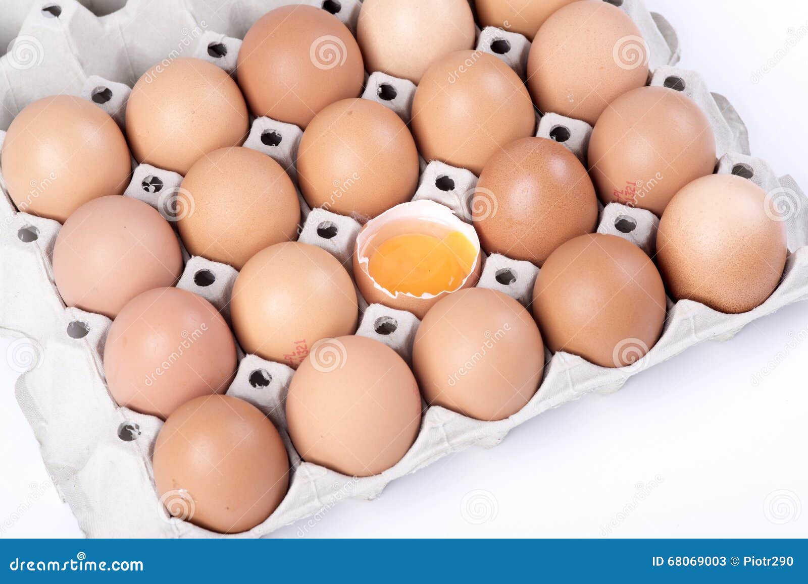 Egg yolk in a container stock image. Image of package - 68069003