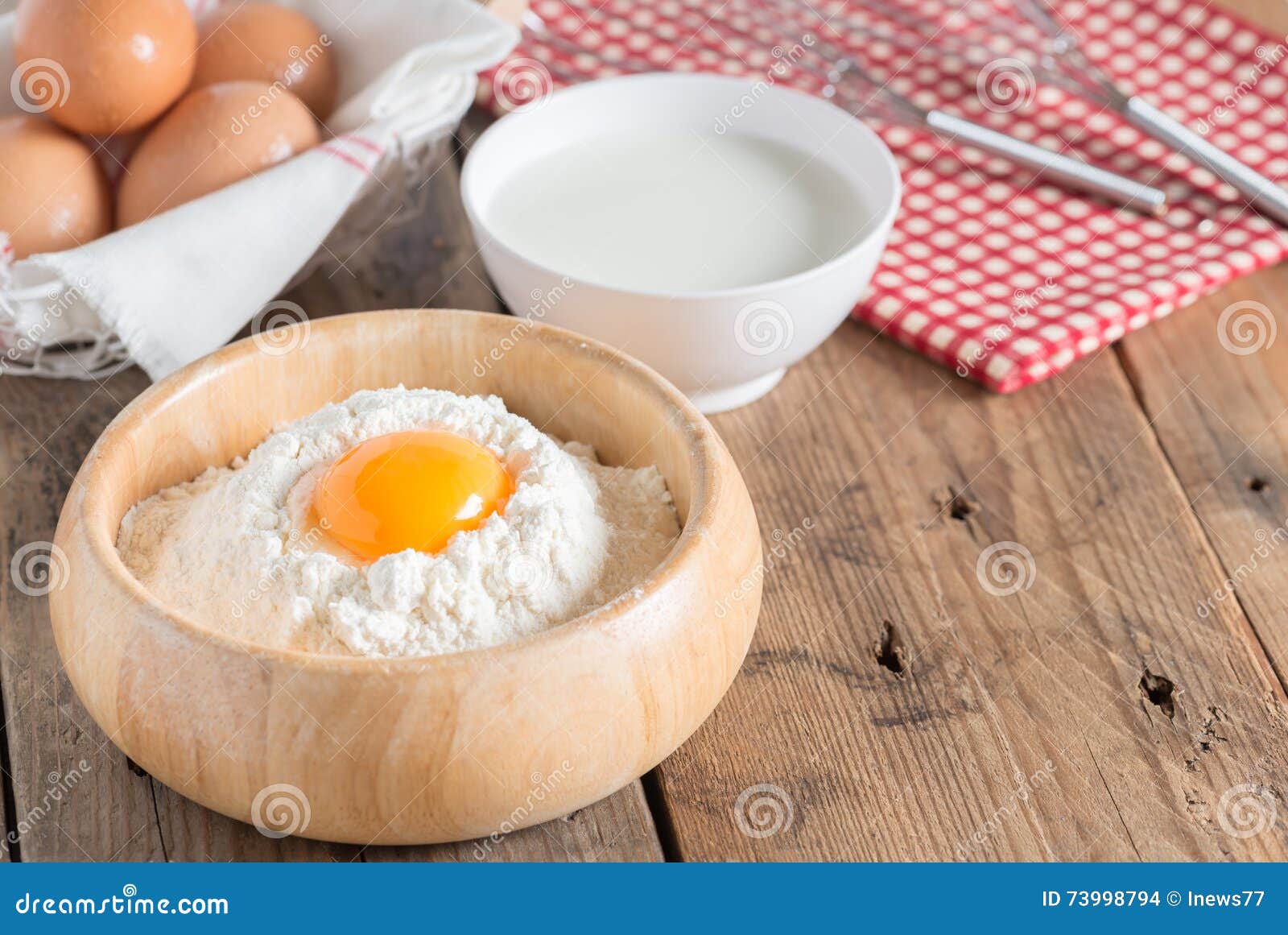 Egg Yolk in the Flour with Milk and Whip for Beating on Wood Tab Stock ...