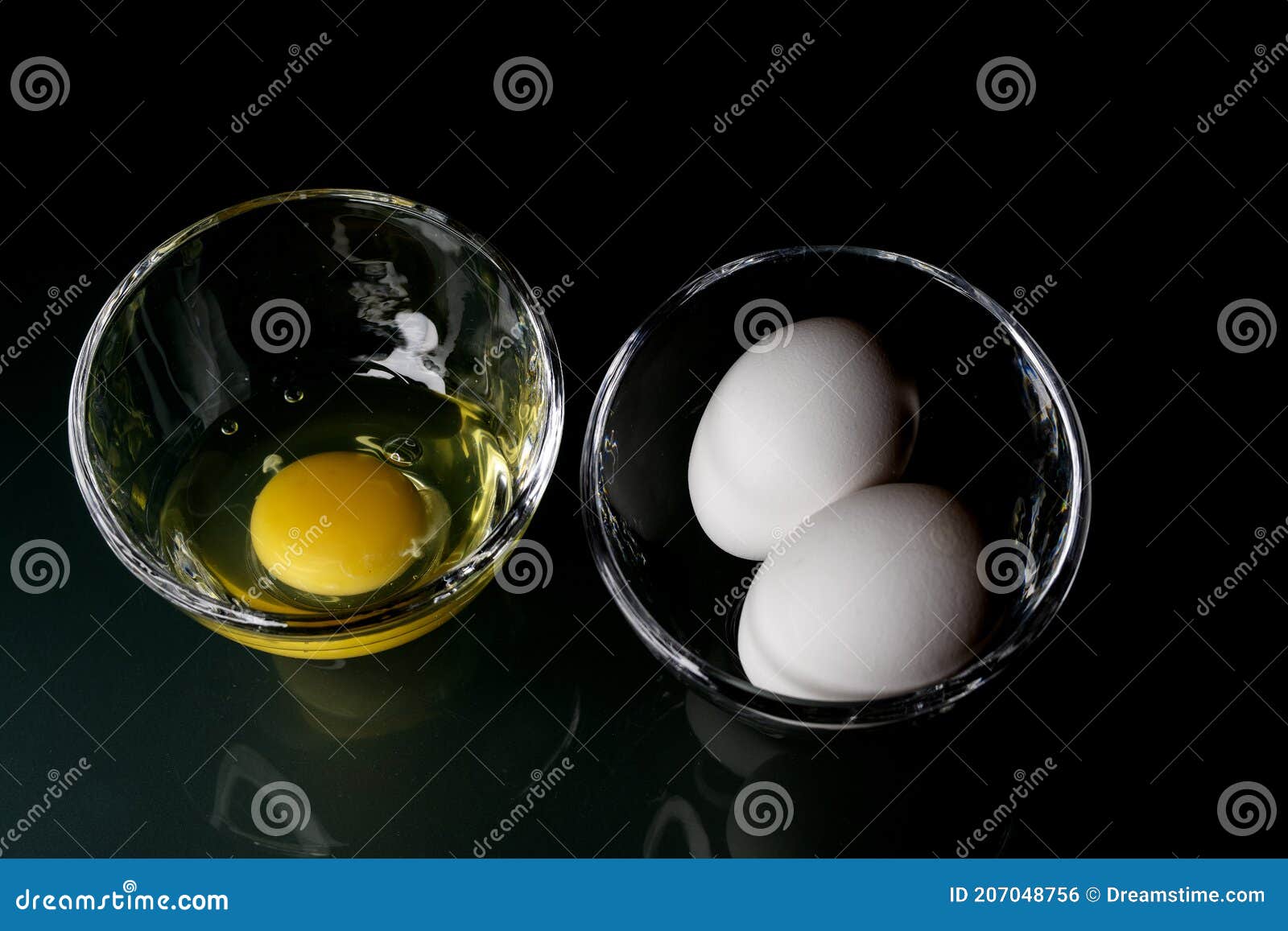 Egg Yolk in a Glass Container Stock Photo - Image of yolk, hand: 207048756