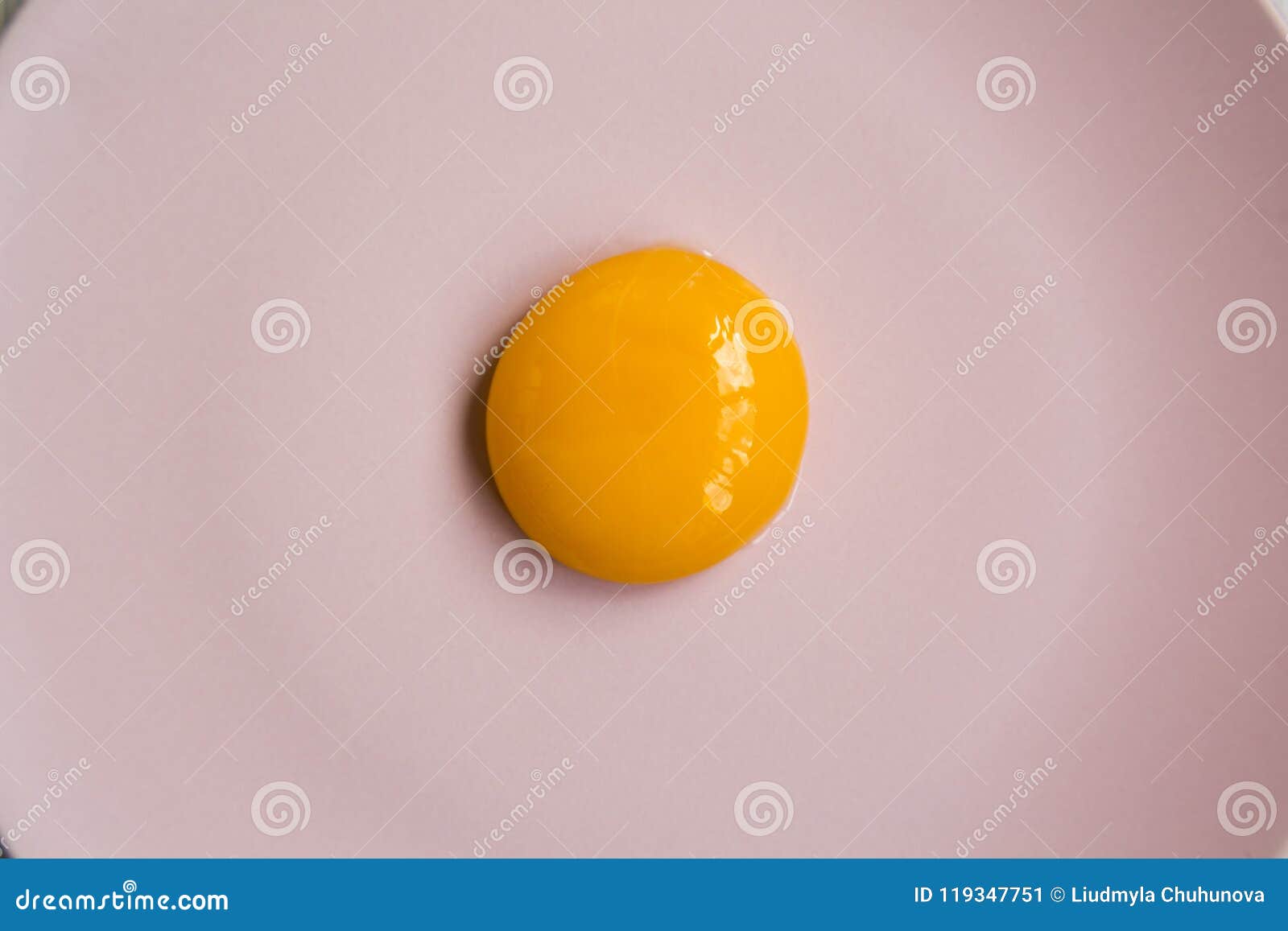 Egg Yolk on a Pink Plate, Top View. Stock Image - Image of pink, liquid ...