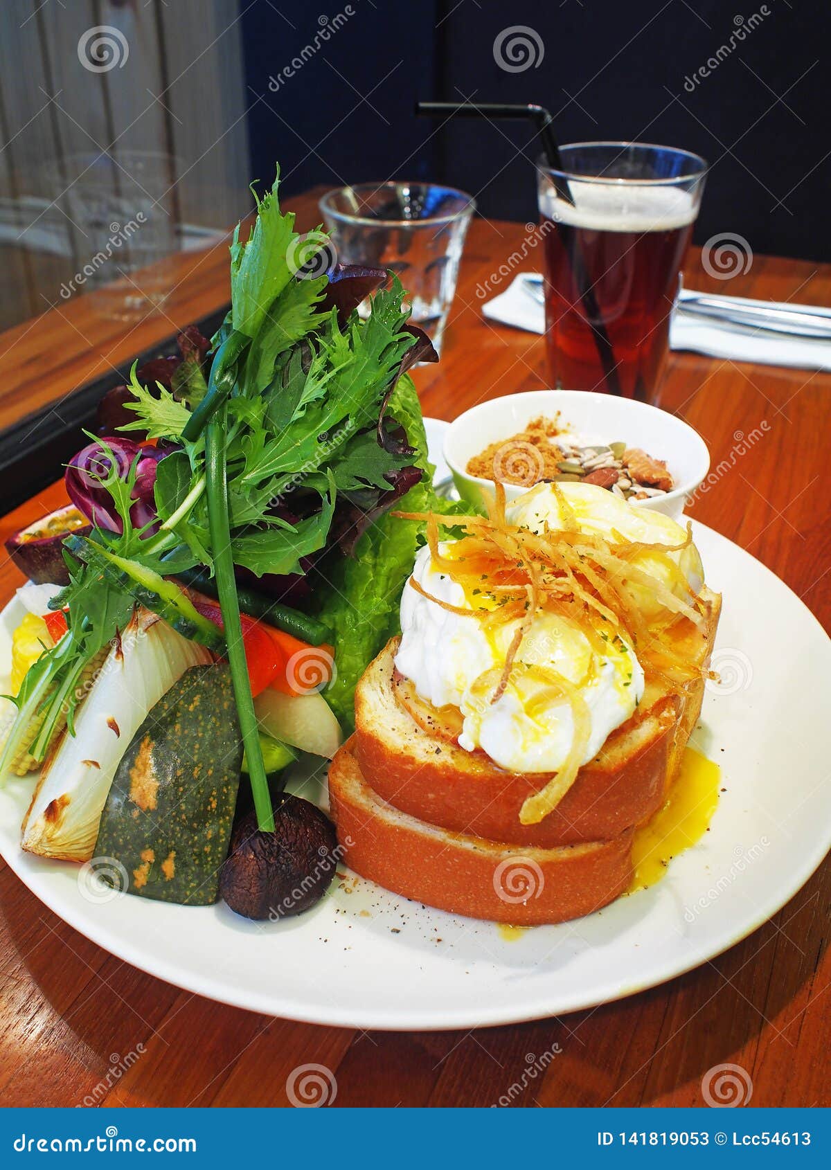 Eggs Benedict on Toast with Salad Stock Image - Image of benedict ...