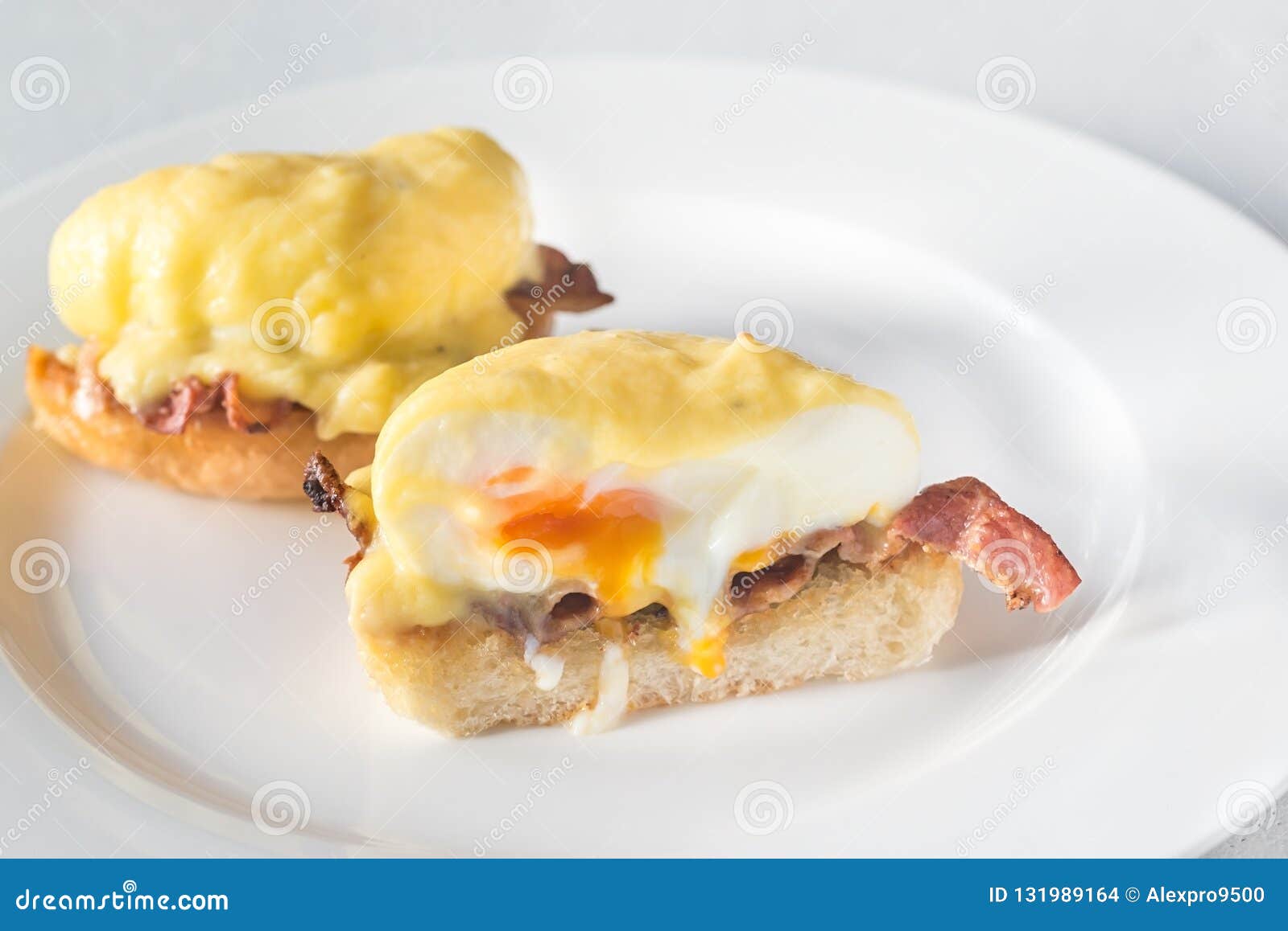 Eggs Benedict on the White Plate Stock Photo - Image of delicious ...