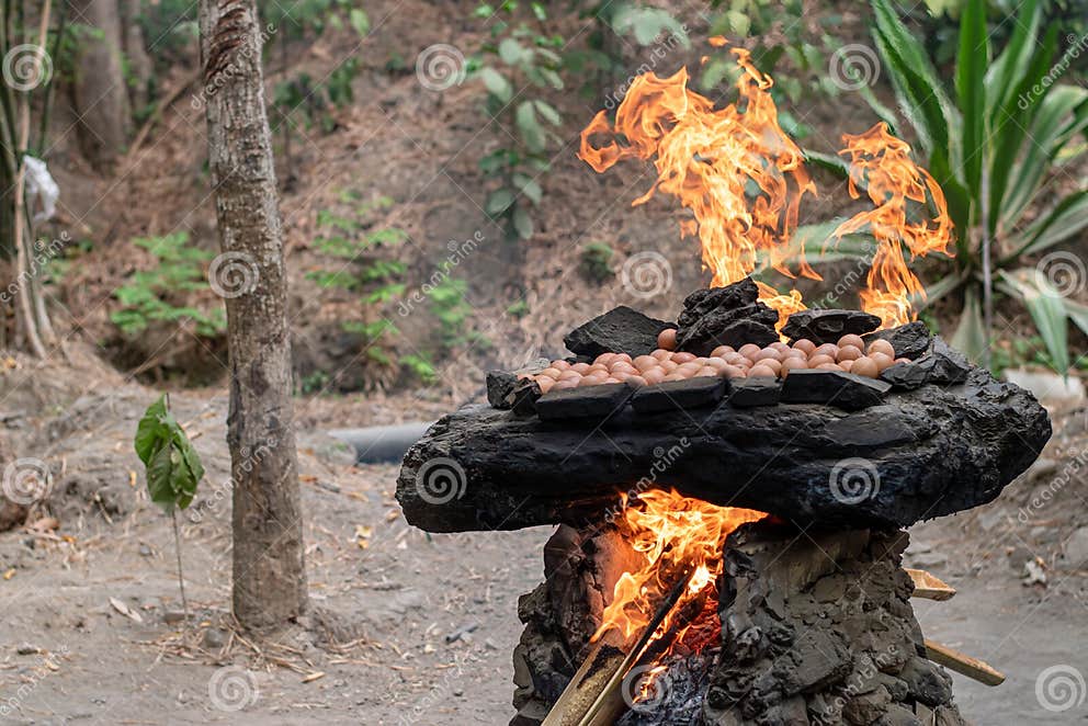 Eggs Boiled on a Large Rock with Fire To Make the Eggs Cook Stock Image ...