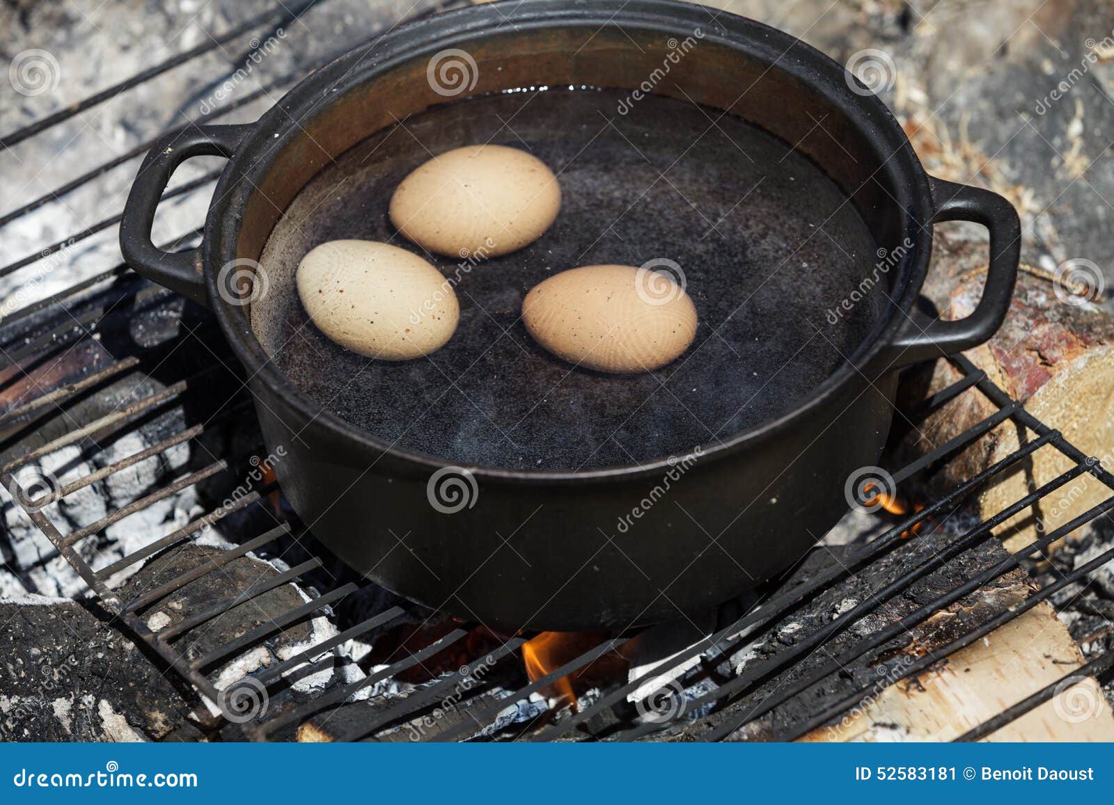 Eggs in a Cast Cauldron Full Boiling Water Stock Image - Image of metal ...