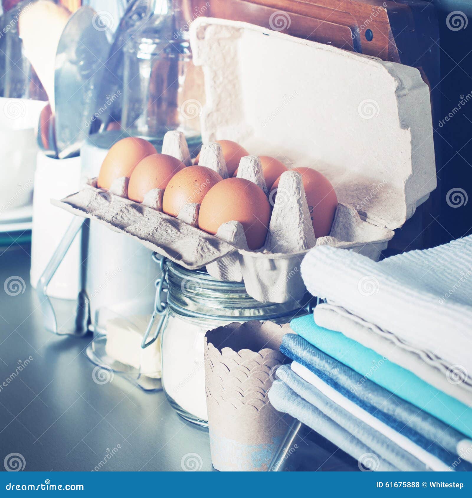 Eggs in the Container on a Kitchen Table-top Stock Photo - Image of ...