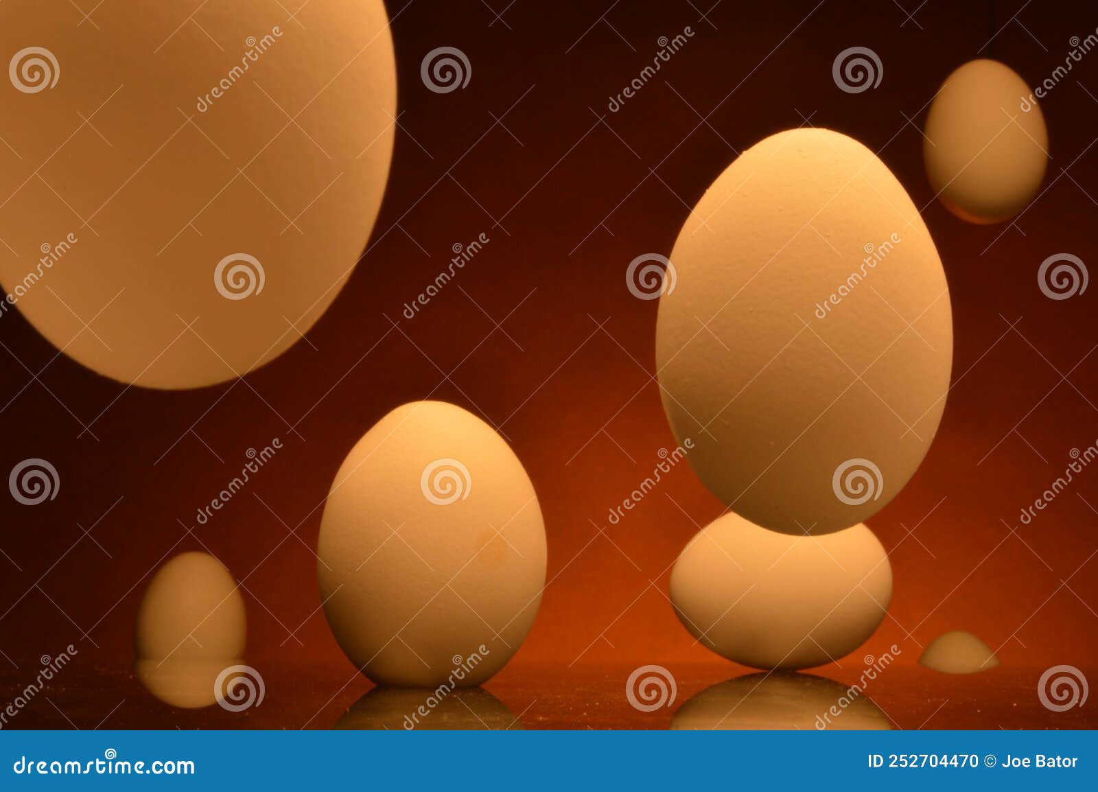 Eggs Floating Upward from Table Surface Stock Photo - Image of ascend ...