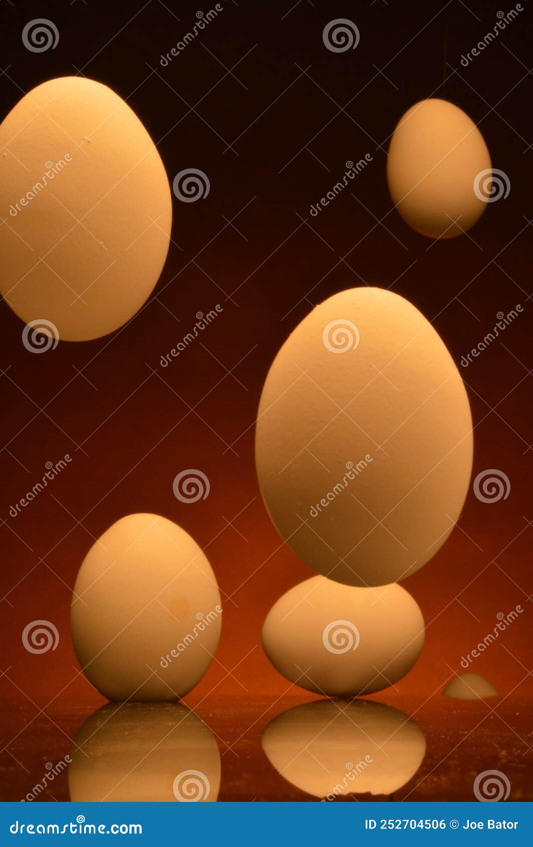 Eggs Floating Upward from Table Surface Stock Photo - Image of ascent ...