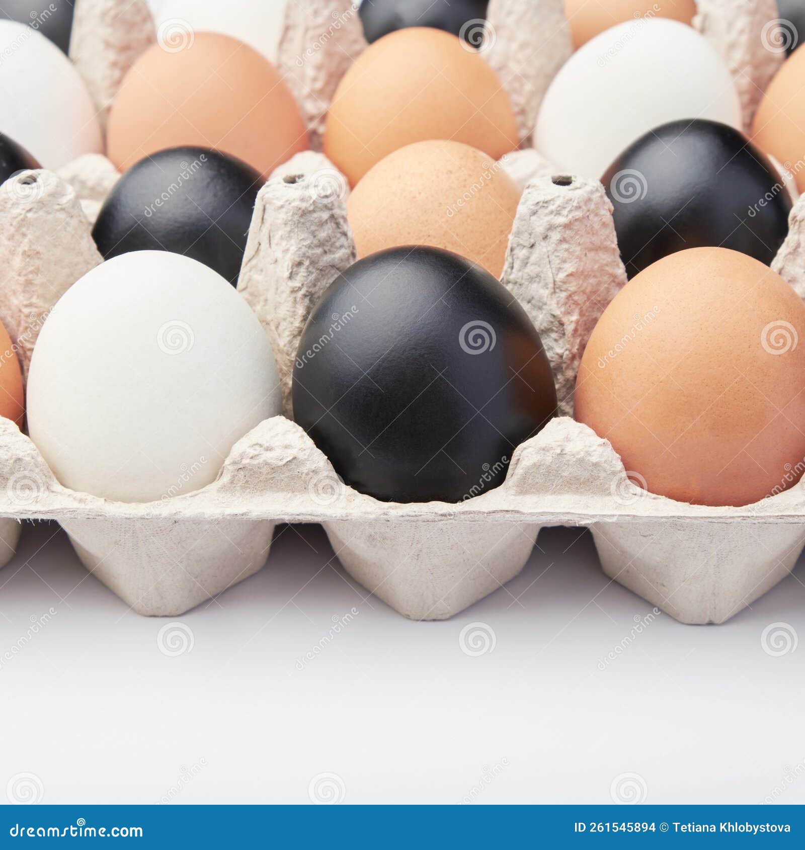 Eggs of Different Colors in Boxes. Black, White and Brown Chicken Eggs ...