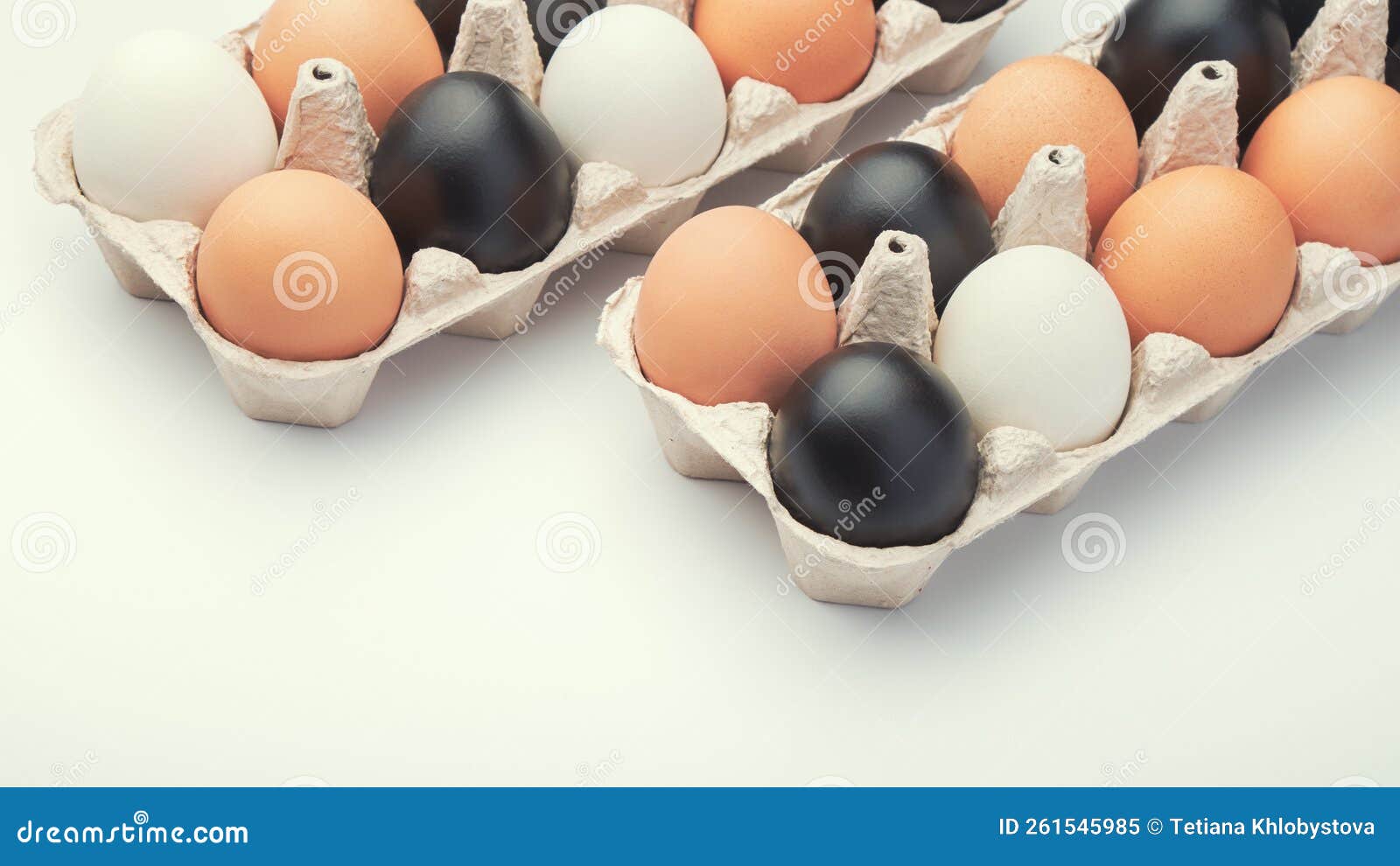 Eggs of Different Colors in Cardboard Boxes. Black, White and Brown ...