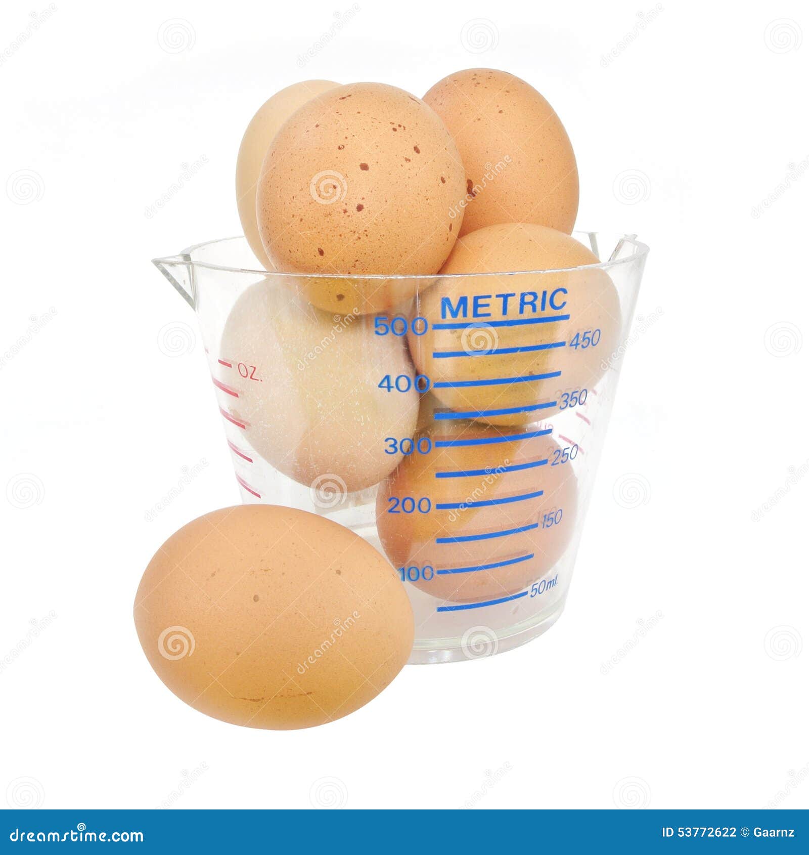 Eggs in measuring cup stock photo. Image of beginning - 53772622