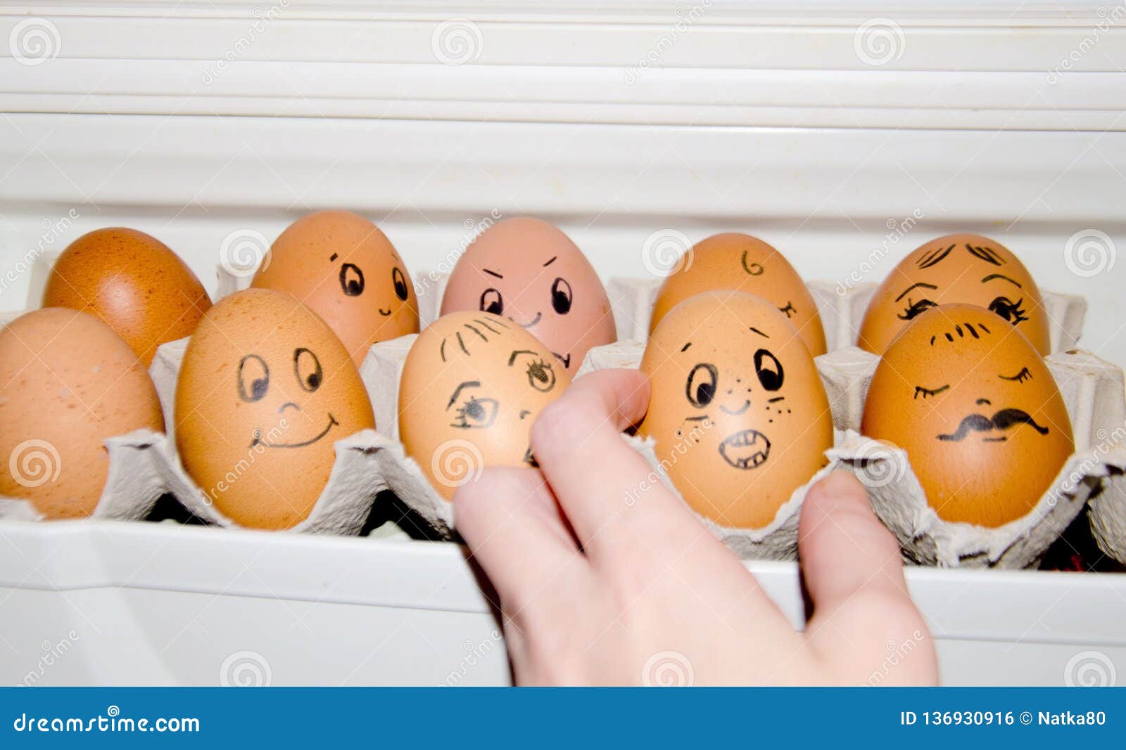 Eggs with Painted Emotions Egg Cell in the Refrigerator Hand Selects ...