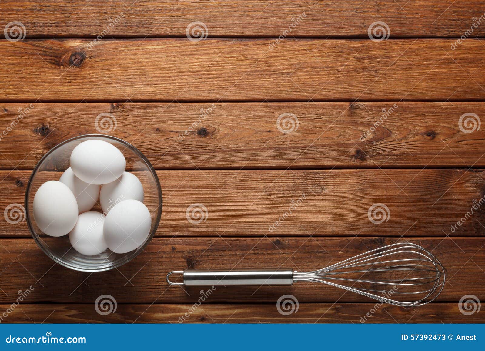 Eggs and Wire Whisk on Rustic Table Stock Image - Image of kitchenware ...