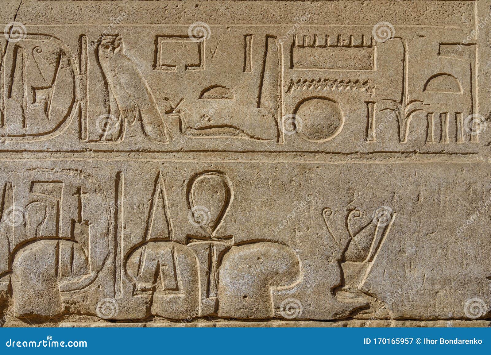 Egyptian Ancient Hieroglyphs on the Stone Wall Stock Image - Image of ...