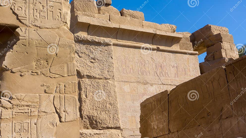 Egyptian Ancient Temple Engravings on Stock Photo - Image of decorative ...