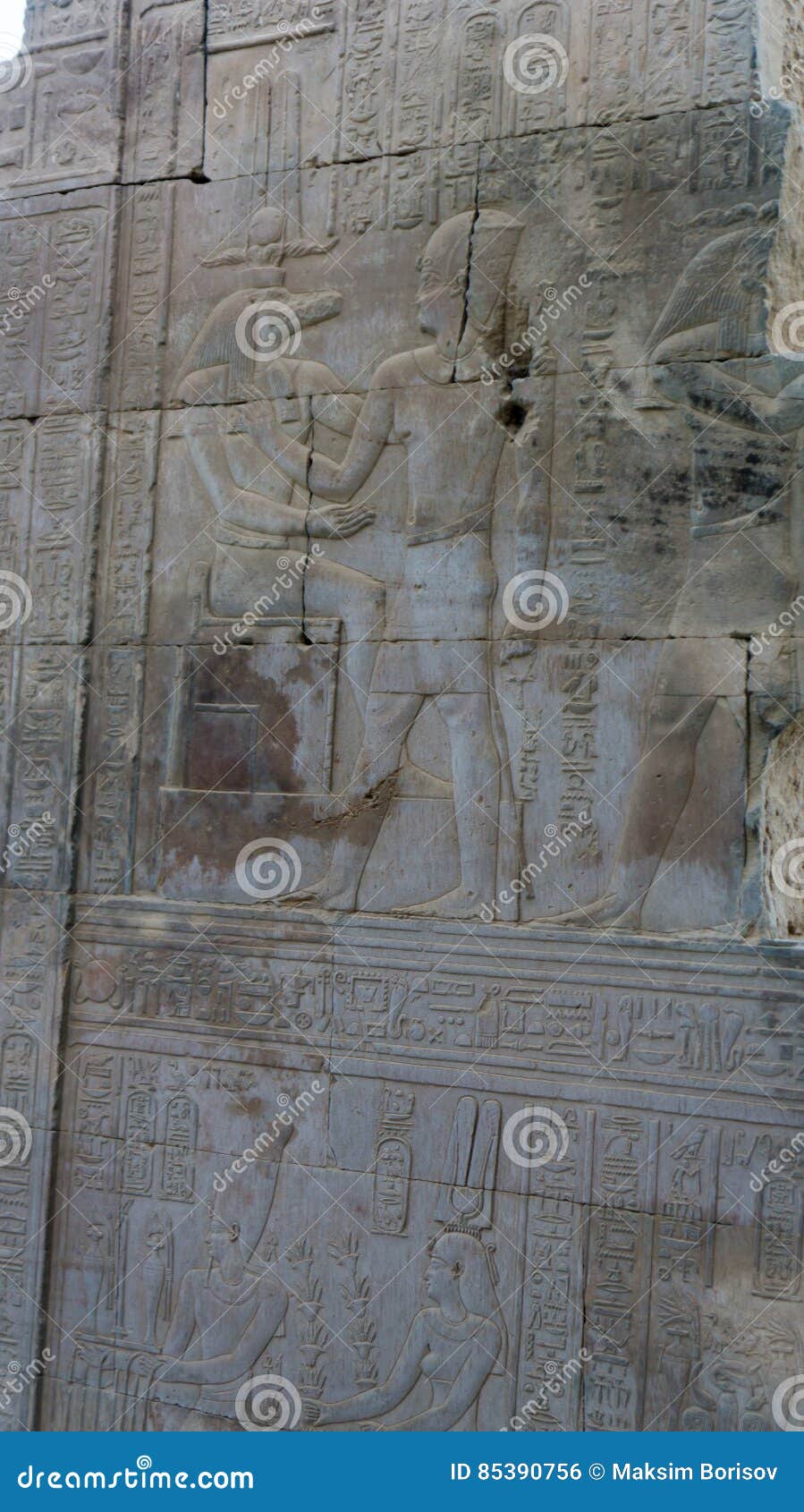 Egyptian Ancient Temple Engravings on Stock Photo - Image of relief ...