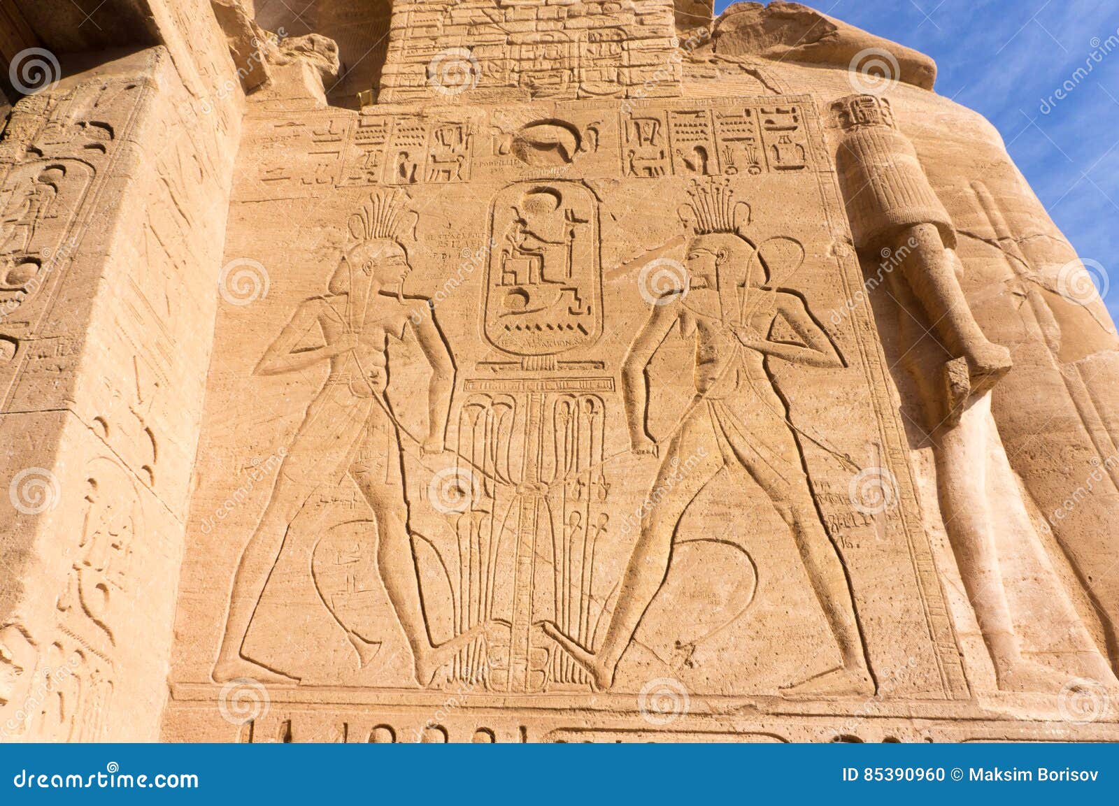 Egyptian Ancient Temple Engravings on Stock Photo - Image of wall ...