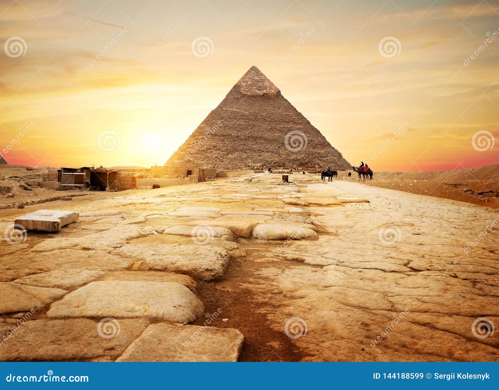 Egyptian pyramid in sand stock image. Image of orange - 144188599